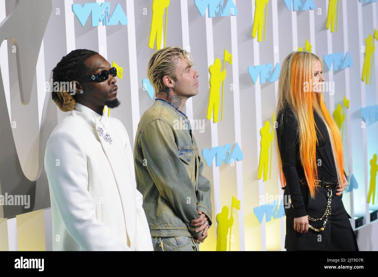Offset, Mod Sun and Avril Lavigne walking on the black carpet at the ...