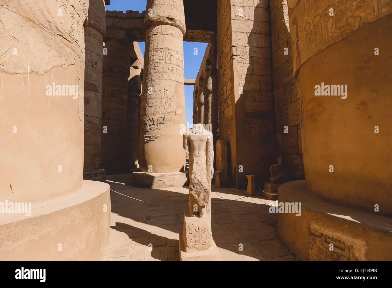 Ancient Sandstone Ruins of Old Egyptian God in the Karnak Temple ...