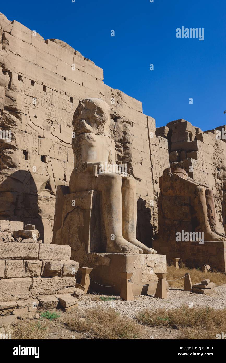 Ancient Sandstone Ruins of Old Egyptian God in the Karnak Temple ...