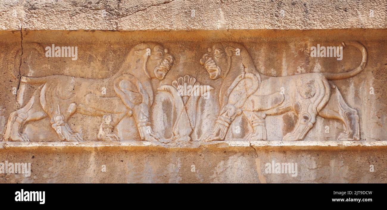 Bar-relief depicting two lions above the entrance to the tomb of ...