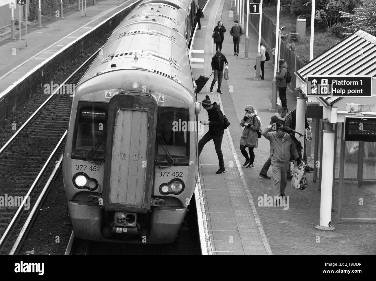Train leaving the station Stock Photo - Alamy