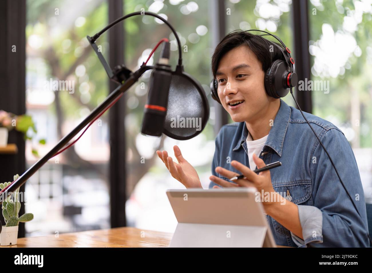Woman podcaster recording audio podcast hi-res stock photography and ...