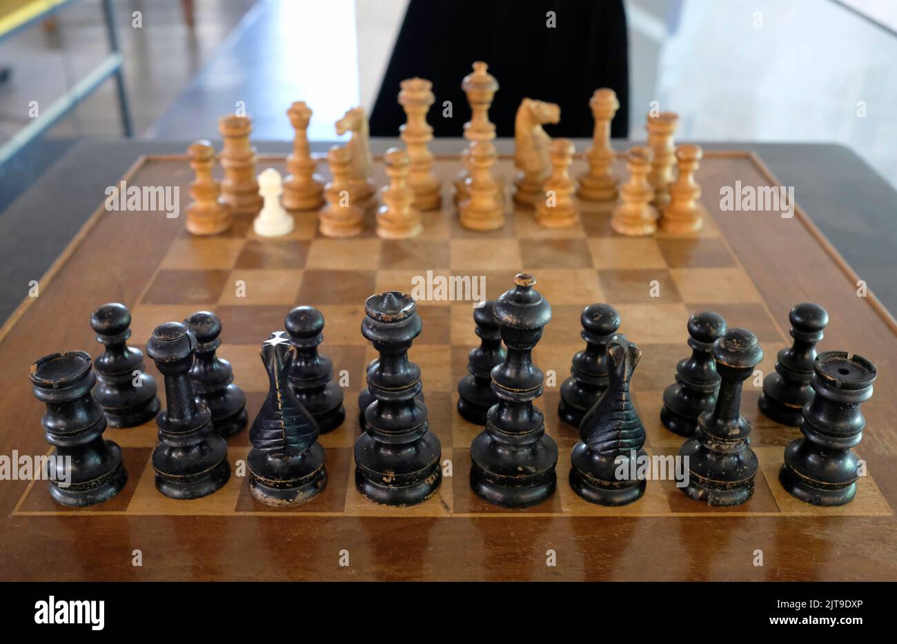 Wooden chessboard with one pawn looking different than the others Stock ...