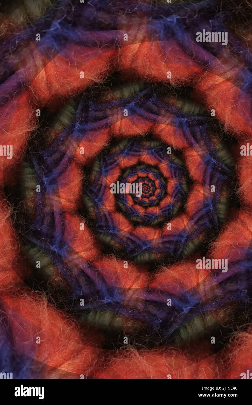 skein of natural fiber wool as traditional spiral towards central black ...