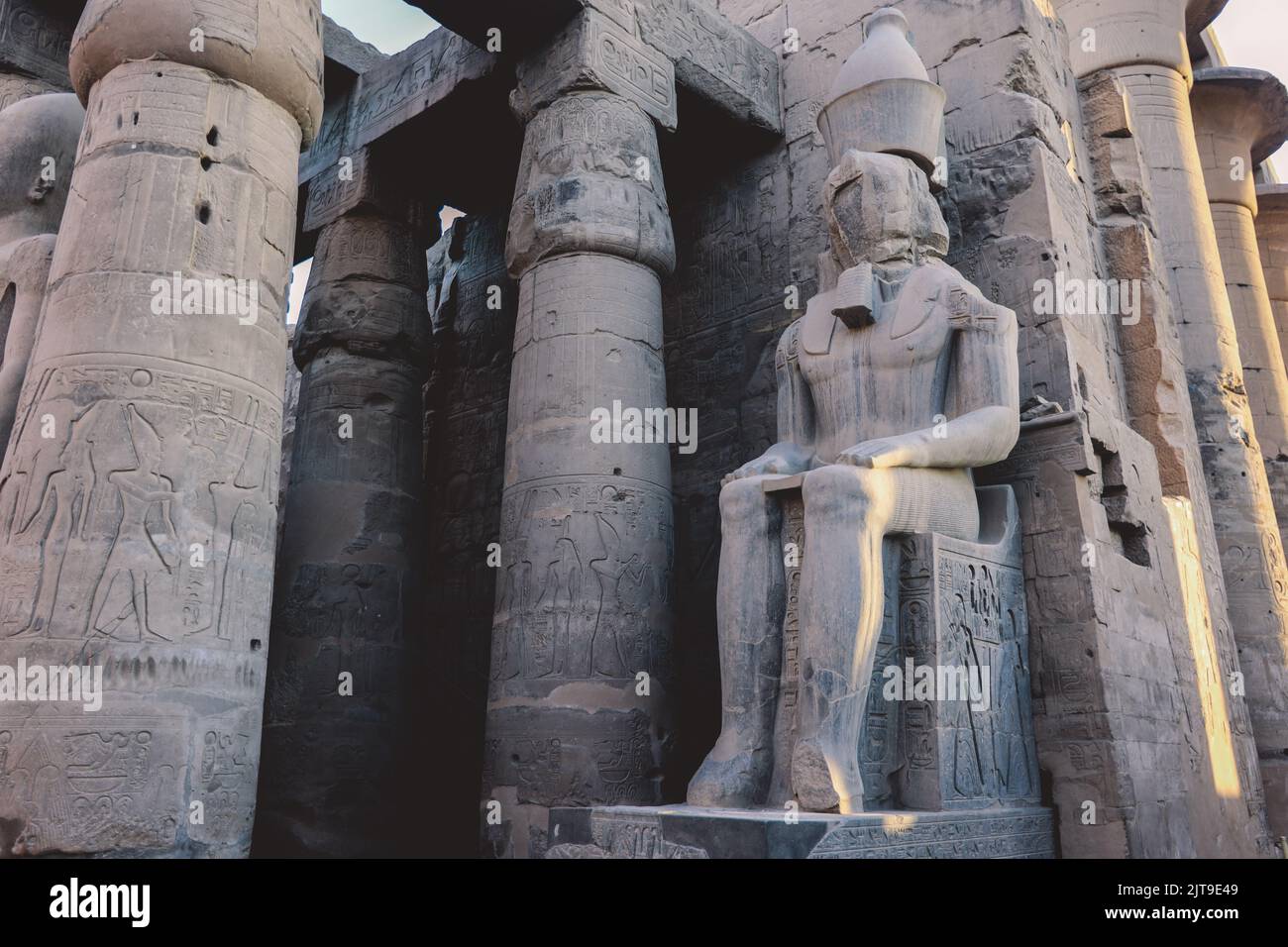 Ancient Egyptian Ruins of God Statues near the Pylon of Luxor Temple ...