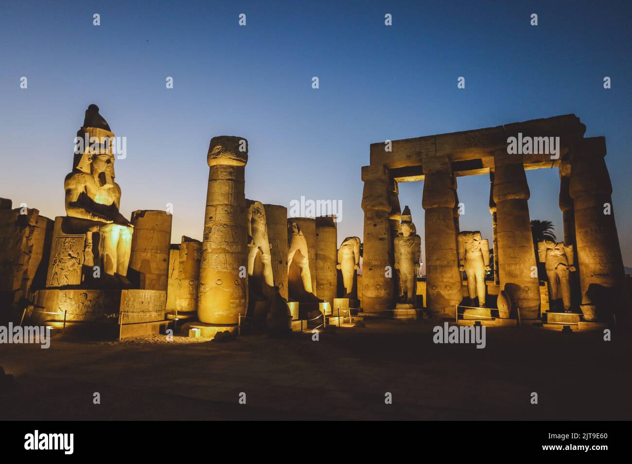 Ancient Egyptian Ruins of God Statues near the Pylon of Luxor Temple ...