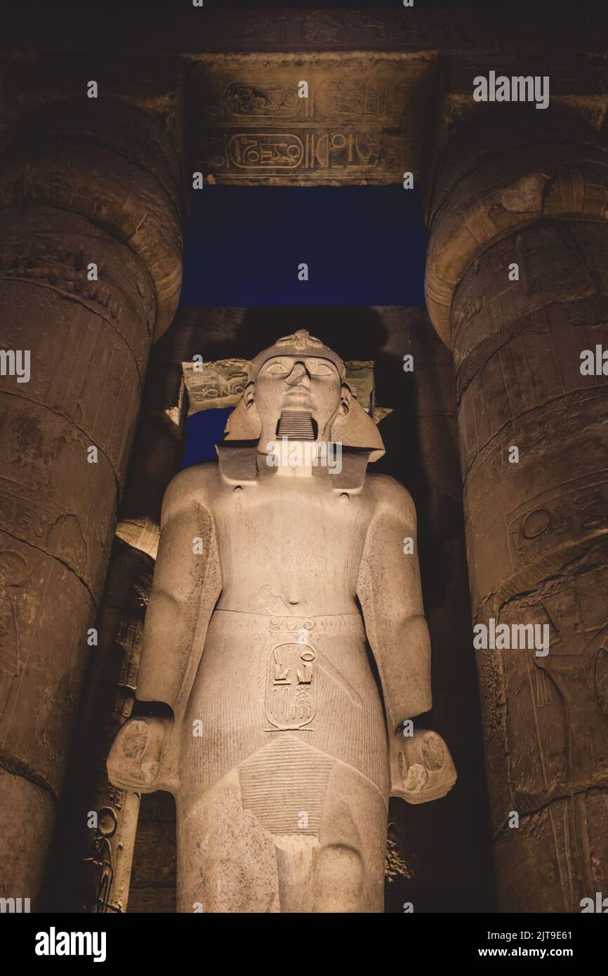 Ancient Egyptian Ruins of God Statues near the Pylon of Luxor Temple ...