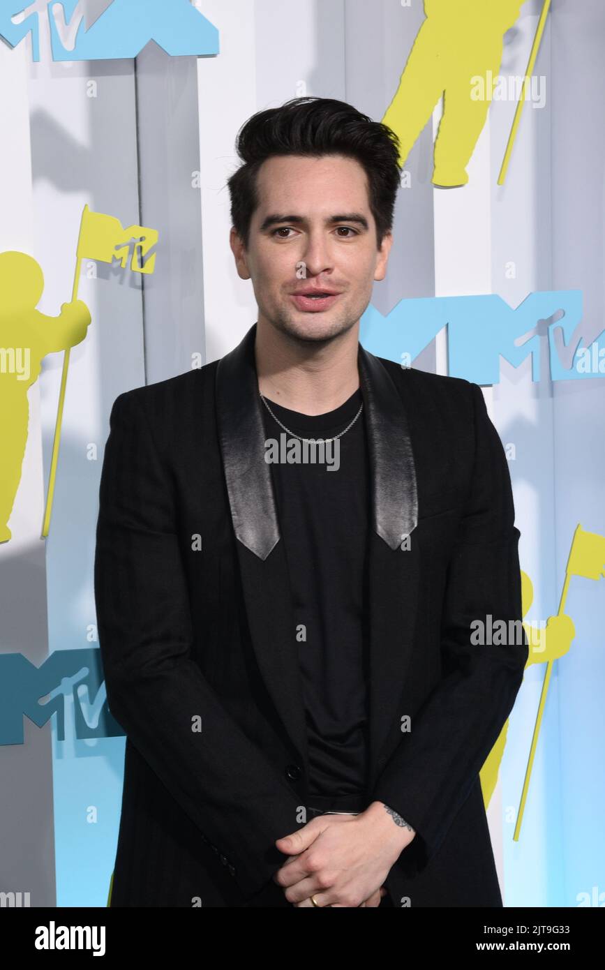 Brandon Urie of Panic at the Disco walking on the black carpet at the ...