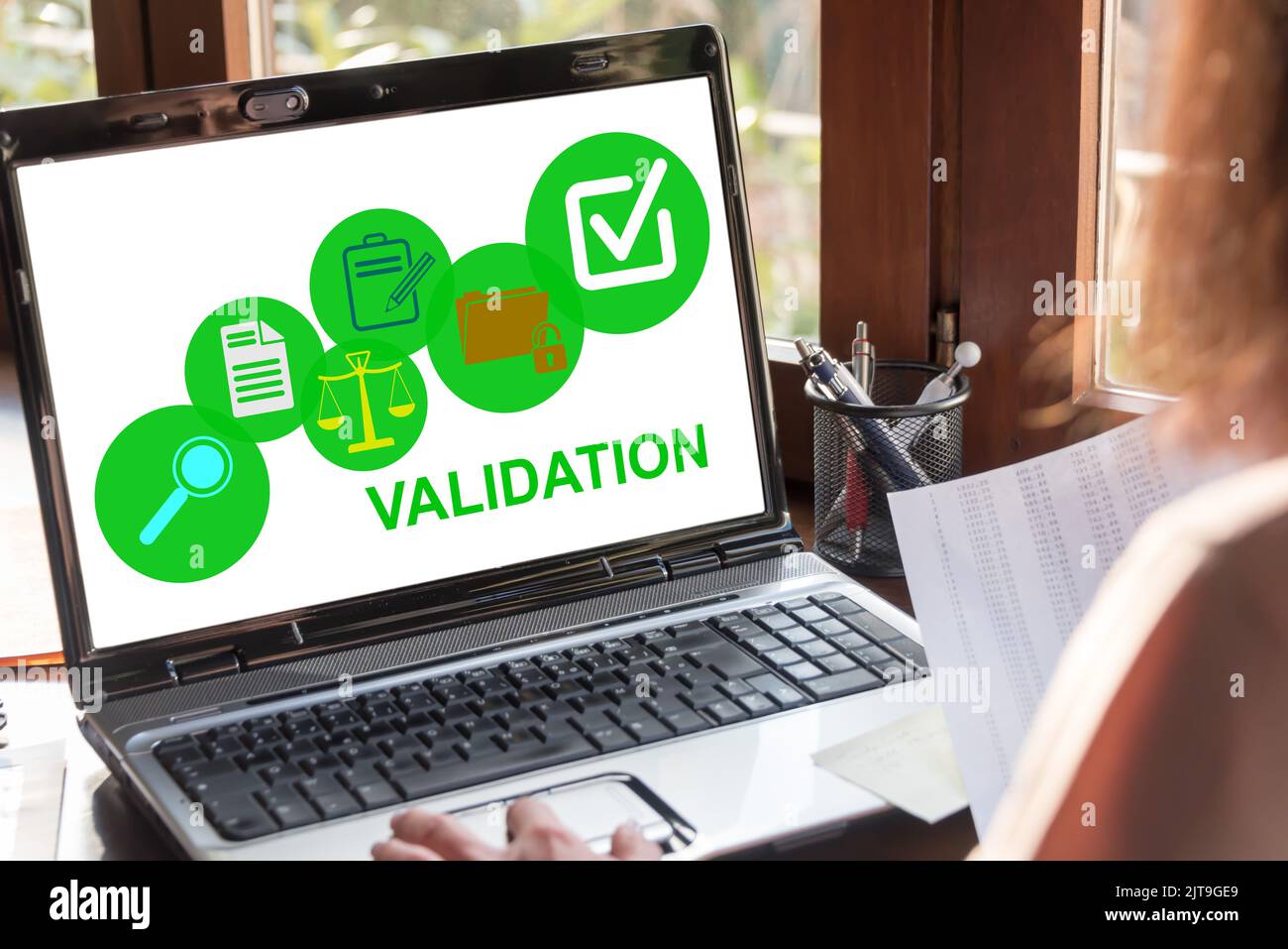 Laptop screen showing validation concept Stock Photo - Alamy