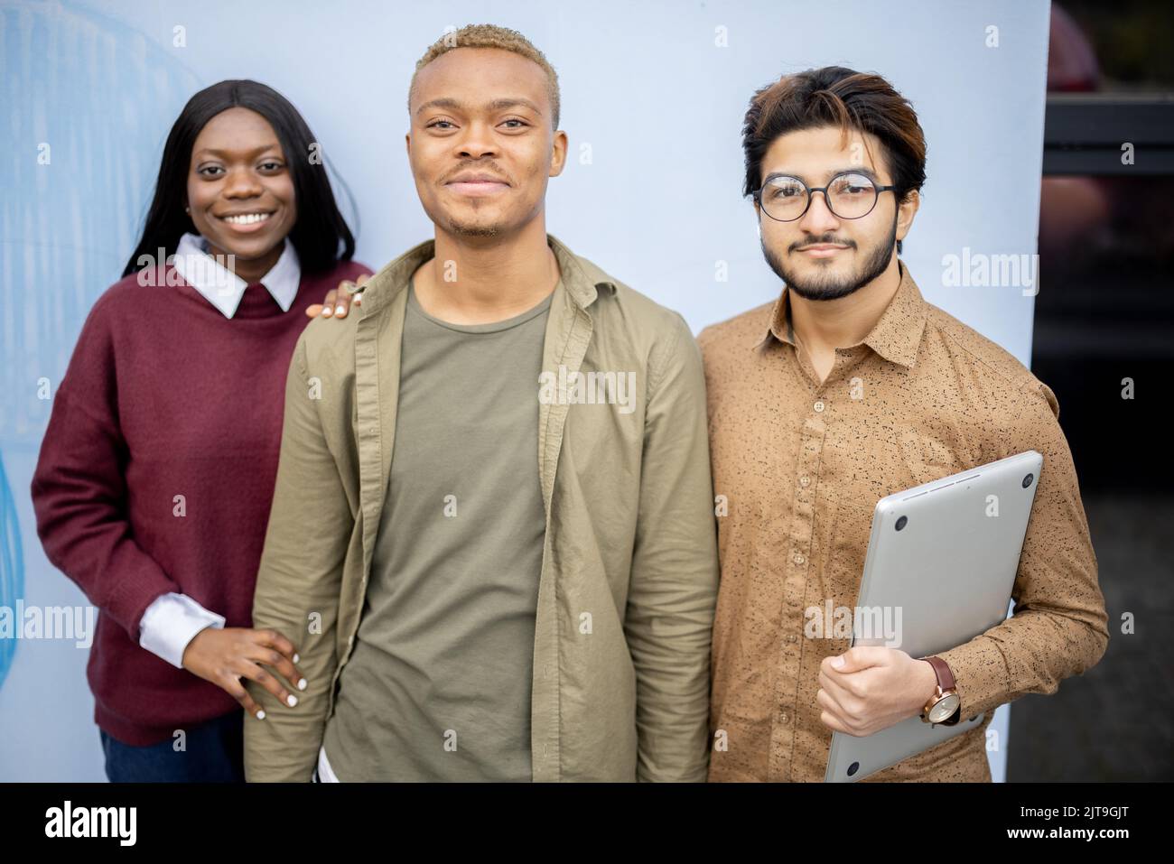Multiracial students outdoors Stock Photo - Alamy