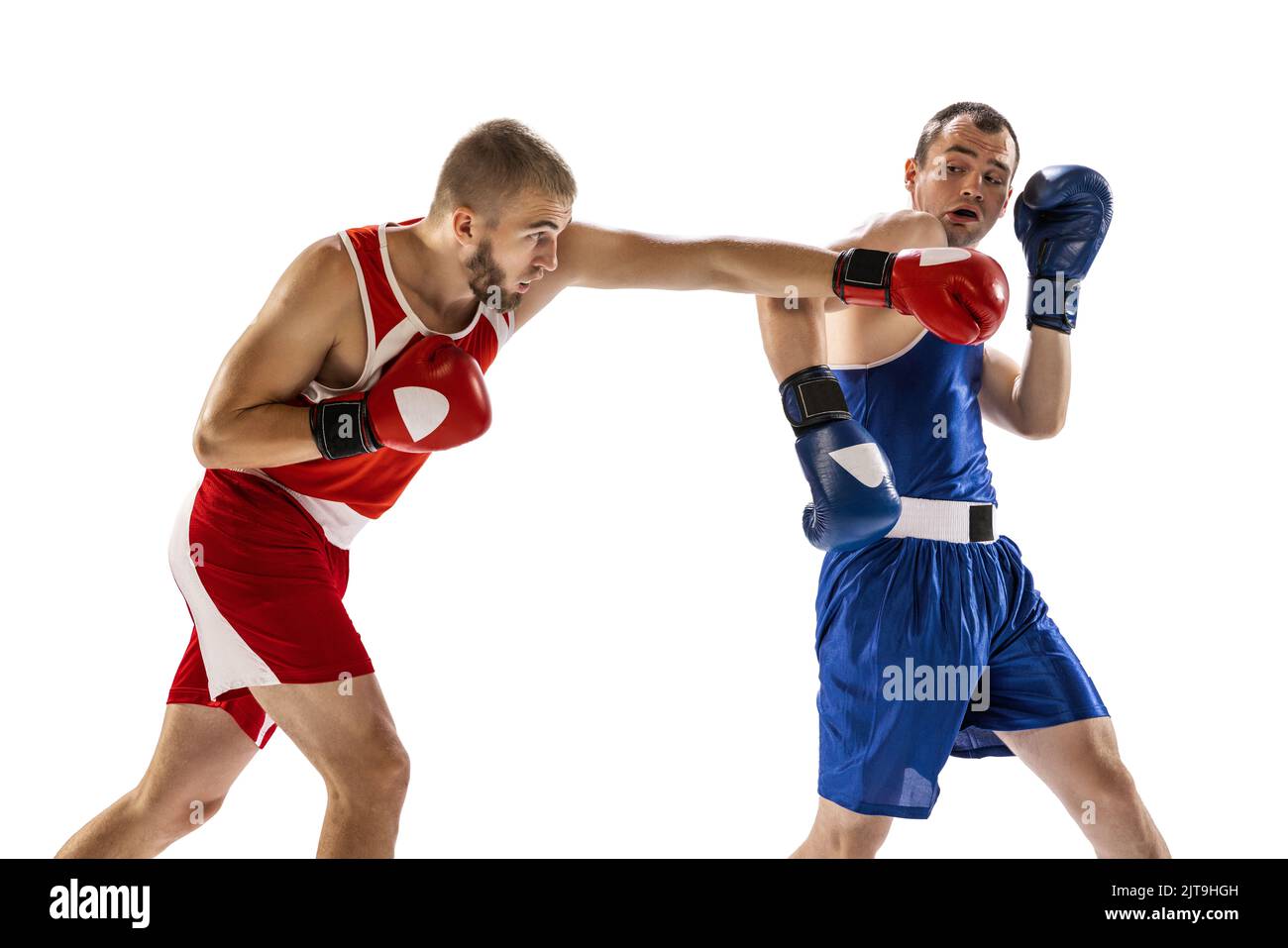 Dynamic portrait of two professional boxer in sports uniform boxing ...