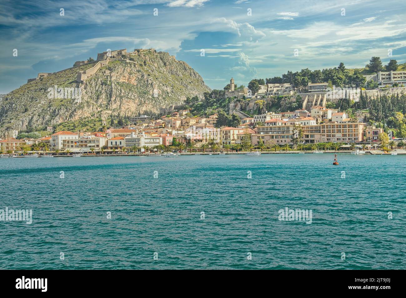 A view of the sea, hills and beautiful Nafplio town in Peloponnese of ...