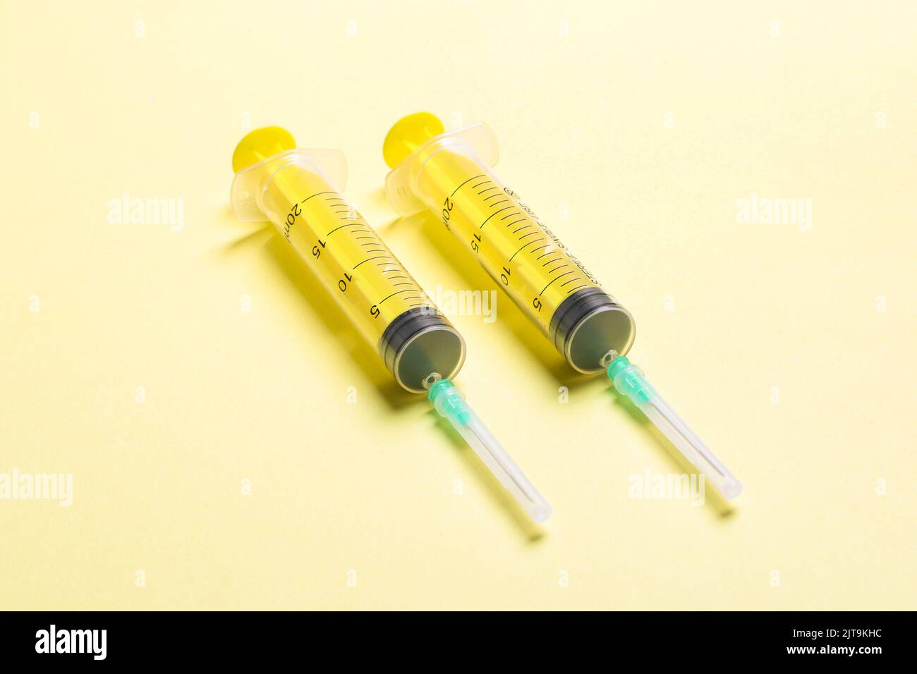Top view of different syringes for injection on colorful background ...