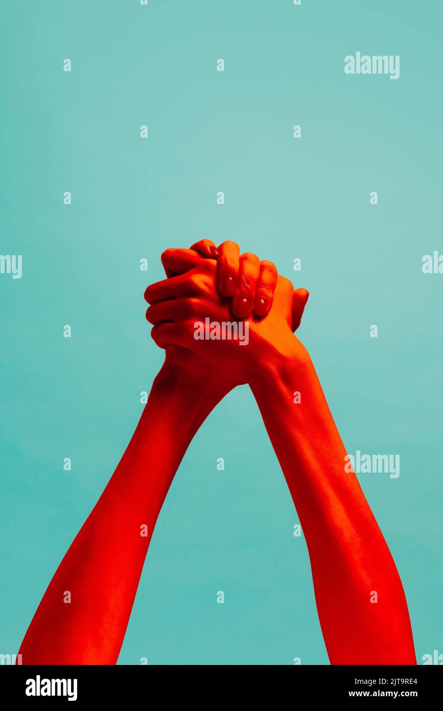 Friendship. Authentic hands gesturing isolated on cyan color background ...