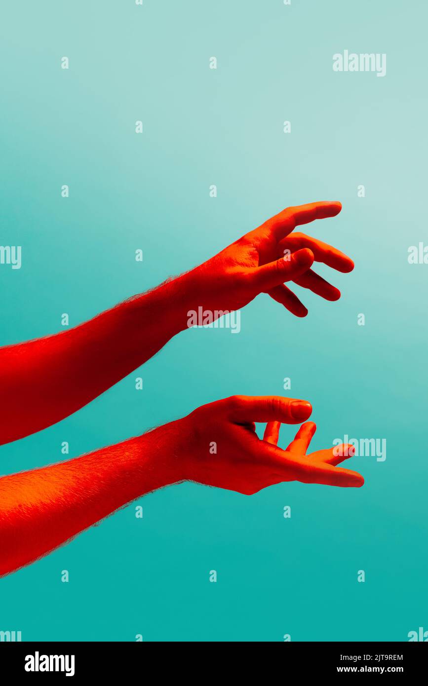 Hope. Authentic hands gesturing isolated on cyan color background in ...