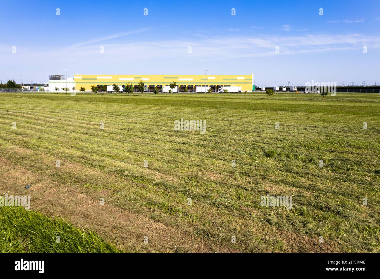 Logistics warehouse center, loading hub, and trucks with cargo trailers ...