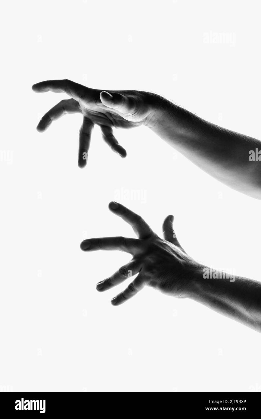 Frighten, scare. Monochrome image of beautiful hands in different ...