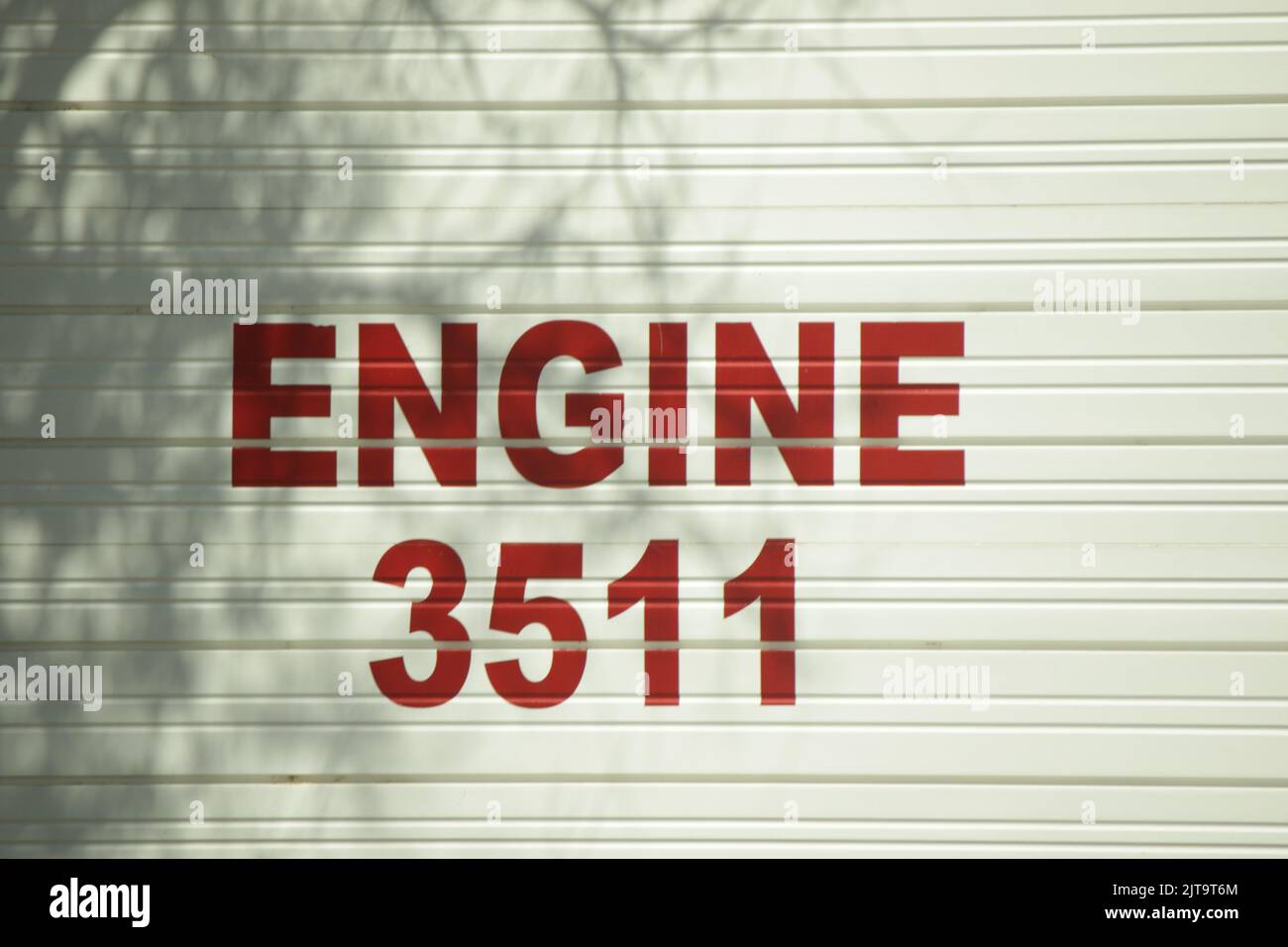 A closeup of sign 'Engine 3511' in white background Stock Photo - Alamy