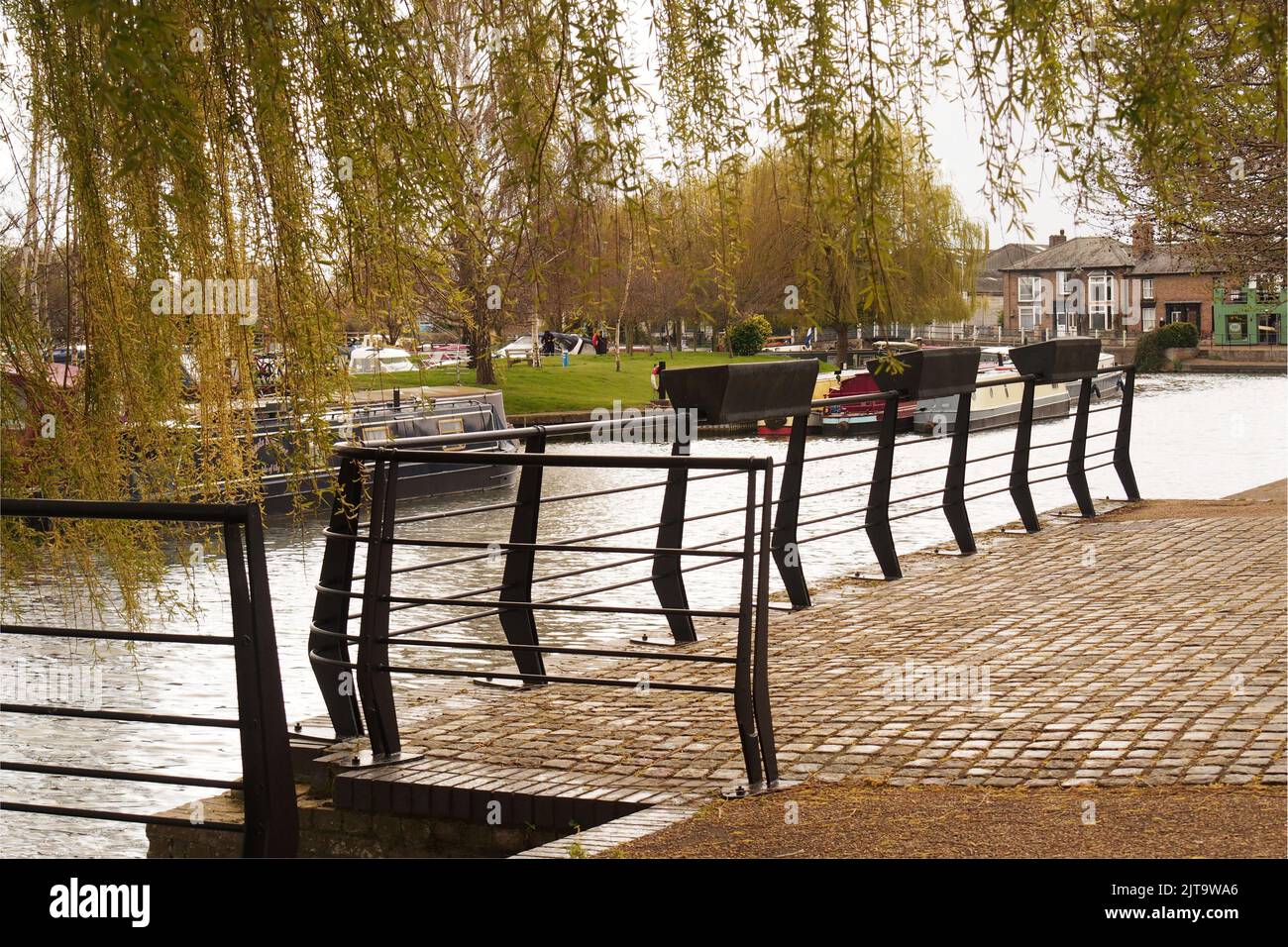 A view of the canal basin at Ely, Cambridgeshire, England, with moored ...