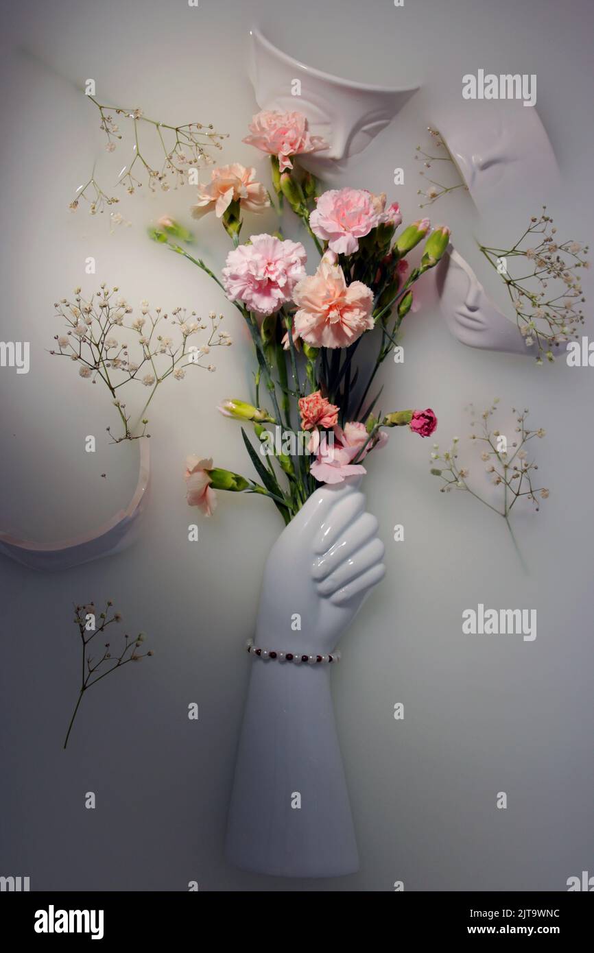 Hand Vase Holding Flowers Stock Photo - Alamy