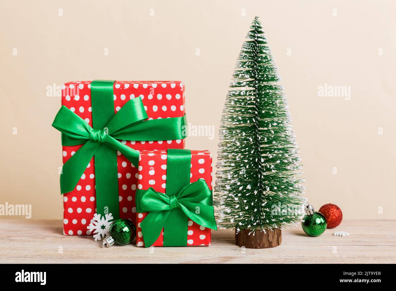 Christmas composition. craft Gift box, small tree, branches and craft ...