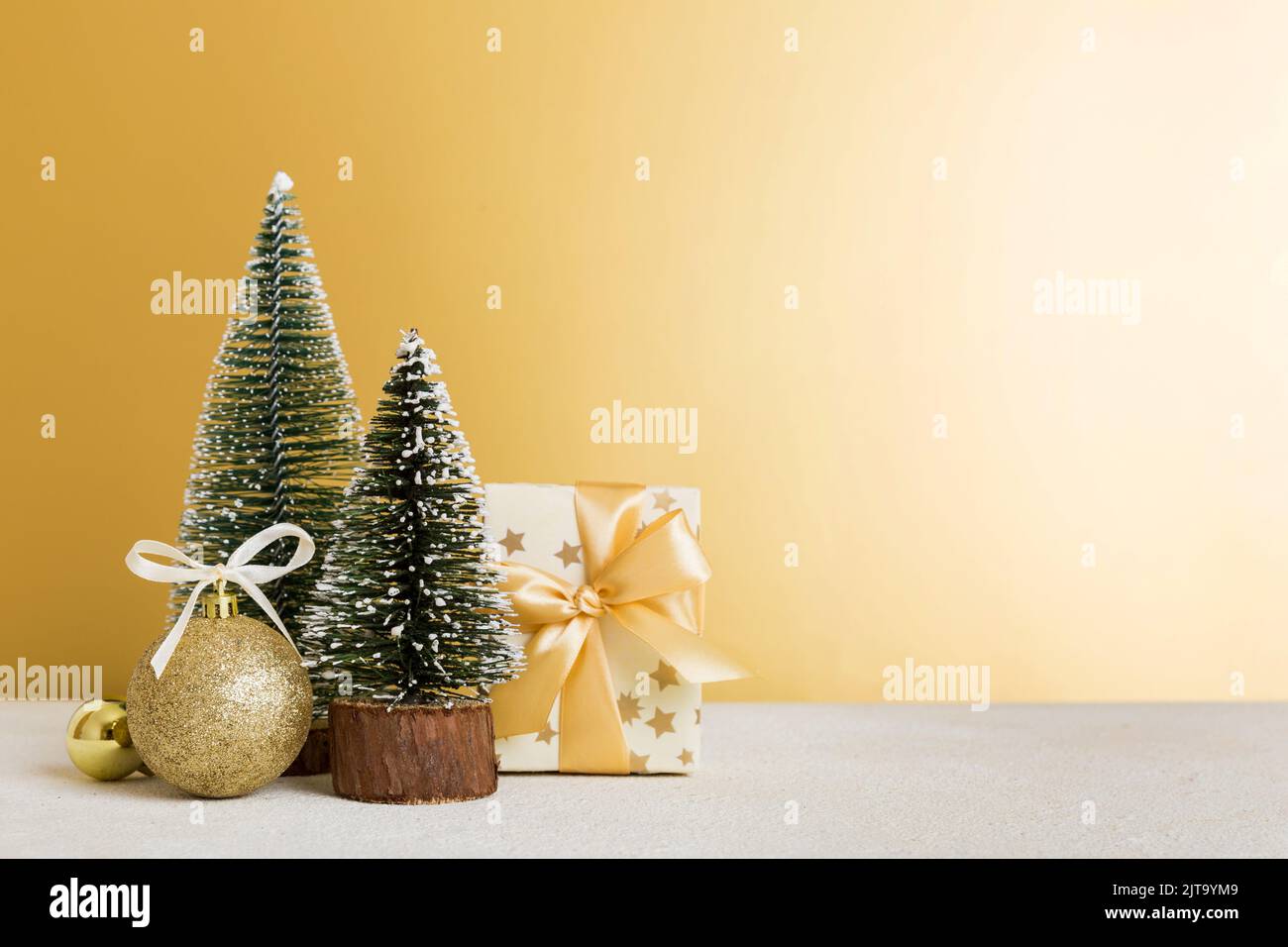 Christmas composition. craft Gift box, small tree, branches and craft ...