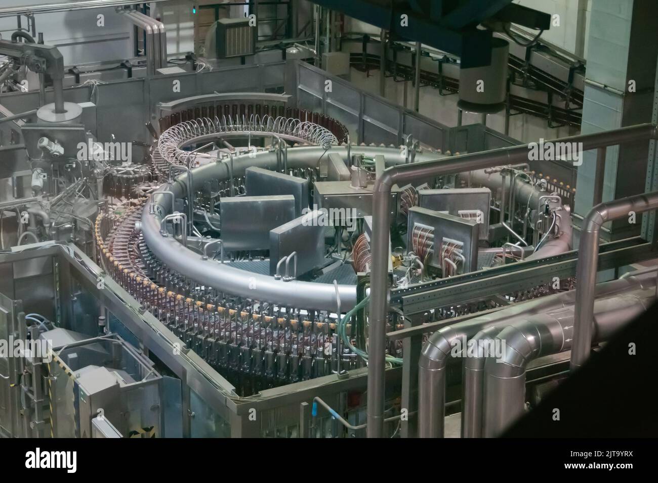 Beer production line - conveyor belt with plastic bottles Stock Photo ...