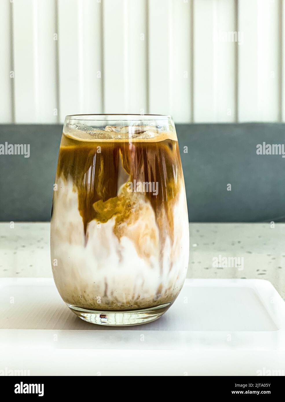 An Iced Coffee Latte served in a coffee shop in Stock Photo - Alamy