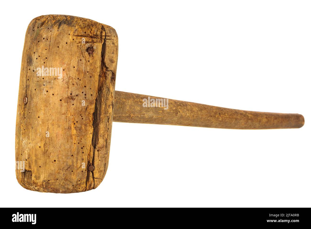 Ancient wooden hammer with woodworm isolated on a white background ...