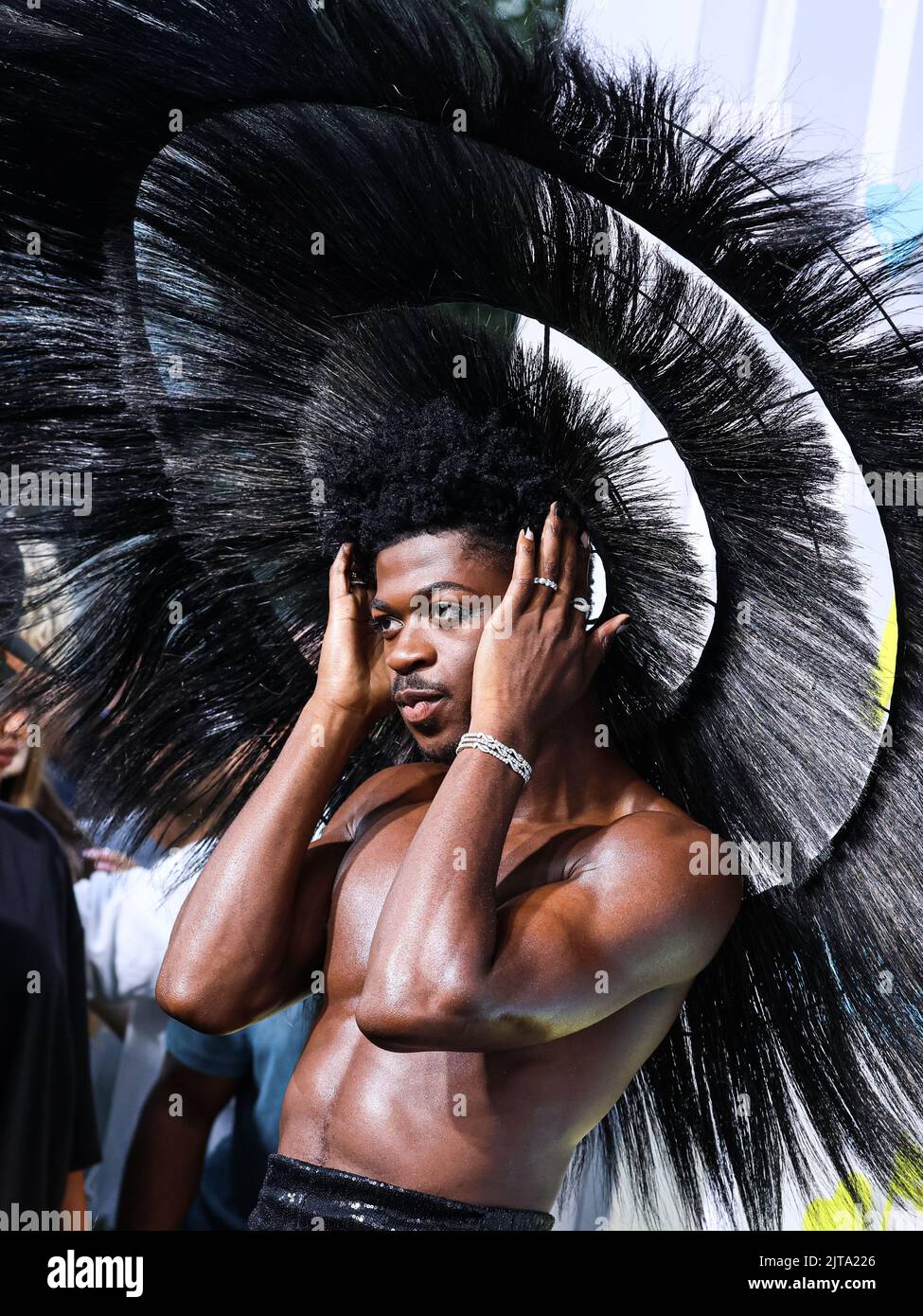 NEWARK, NEW JERSEY, USA - AUGUST 28: Lil Nas X arrives at the 2022 MTV ...