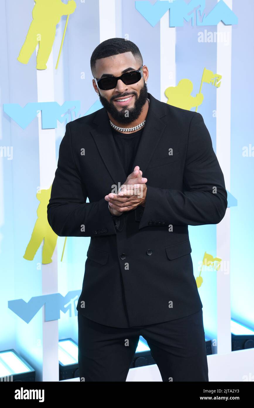 Johnny Middlebrooks walking on the black carpet at the 2022 MTV Video ...