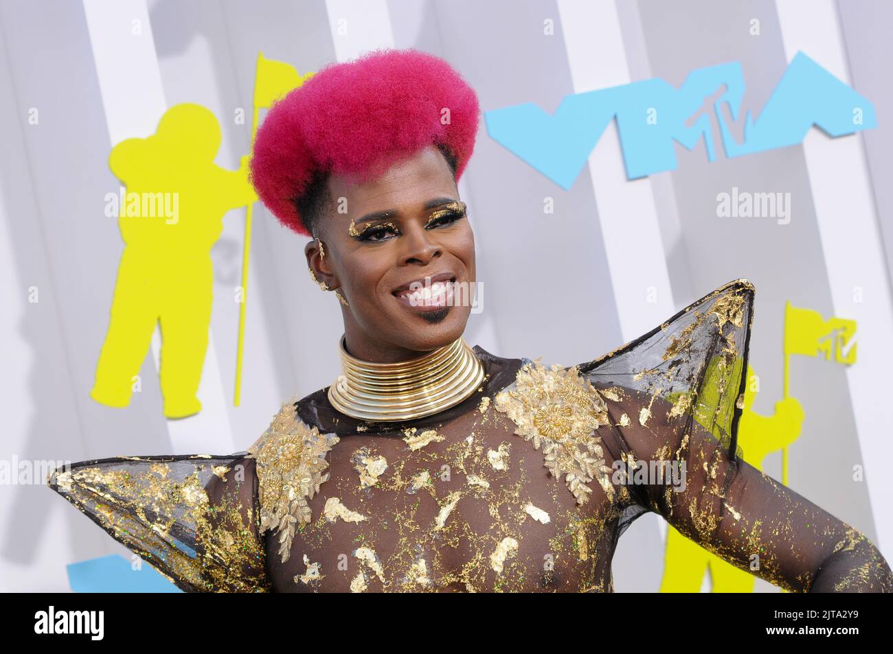 Prince Derek Doll walking on the black carpet at the 2022 MTV Video ...