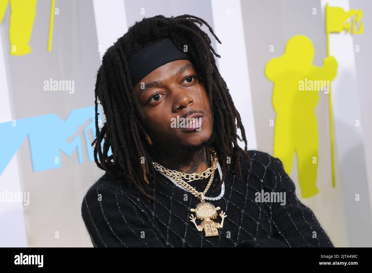 JID walking on the black carpet at the 2022 MTV Video Music Awards held ...