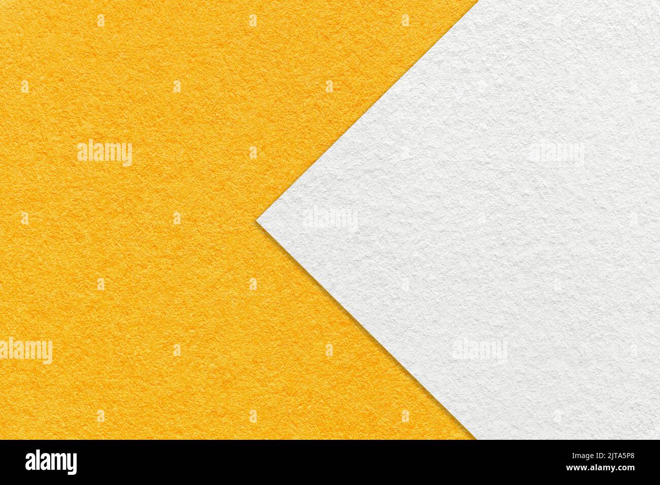 Texture of bright yellow paper background, half two colors with white ...
