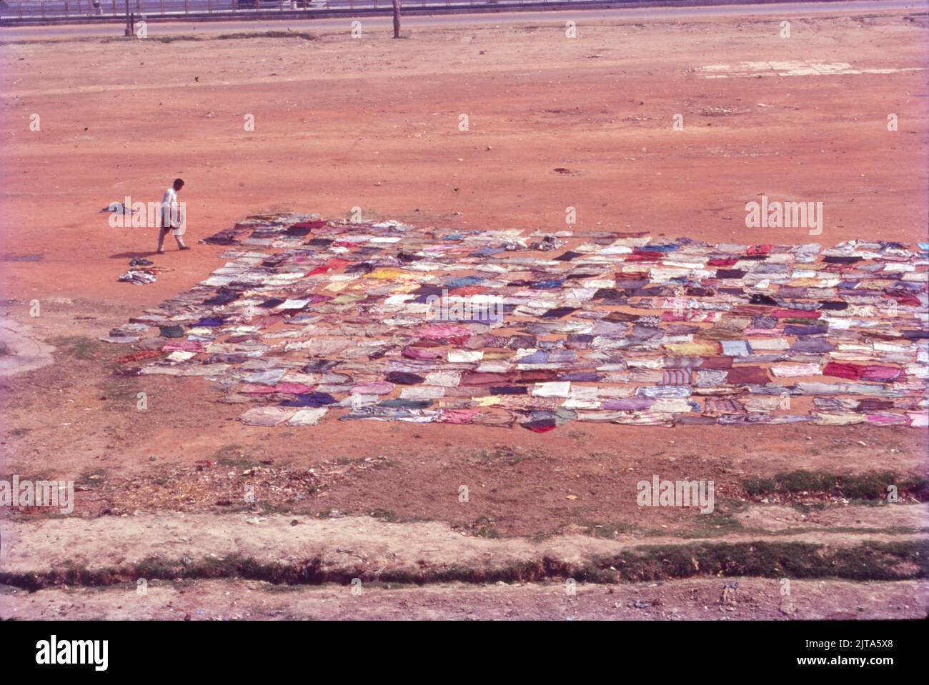 Drying clothes on ground hi-res stock photography and images - Alamy