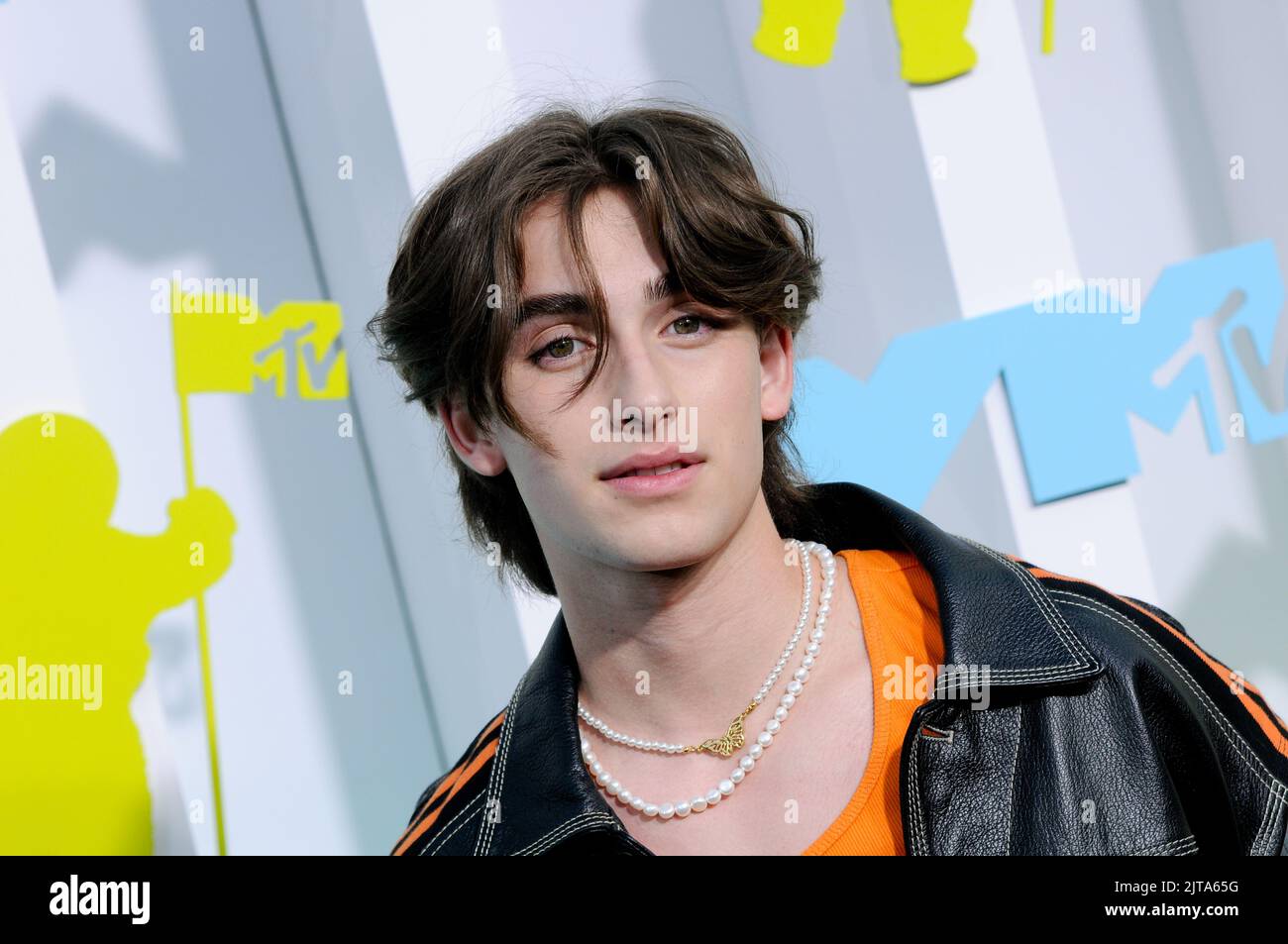 Johnny Orlando walking on the black carpet at the 2022 MTV Video Music ...