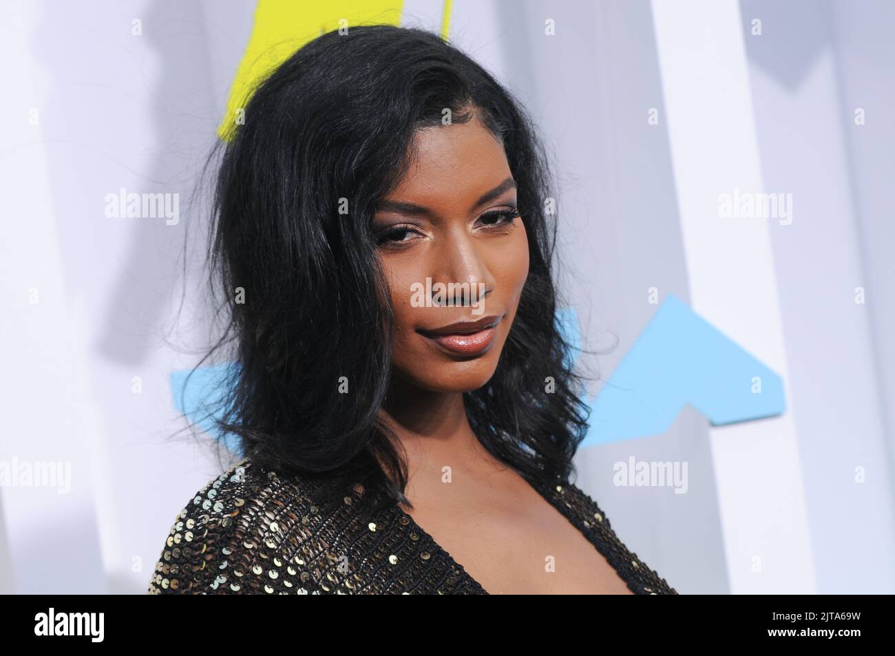 Taylor Rooks walking on the black carpet at the 2022 MTV Video Music ...