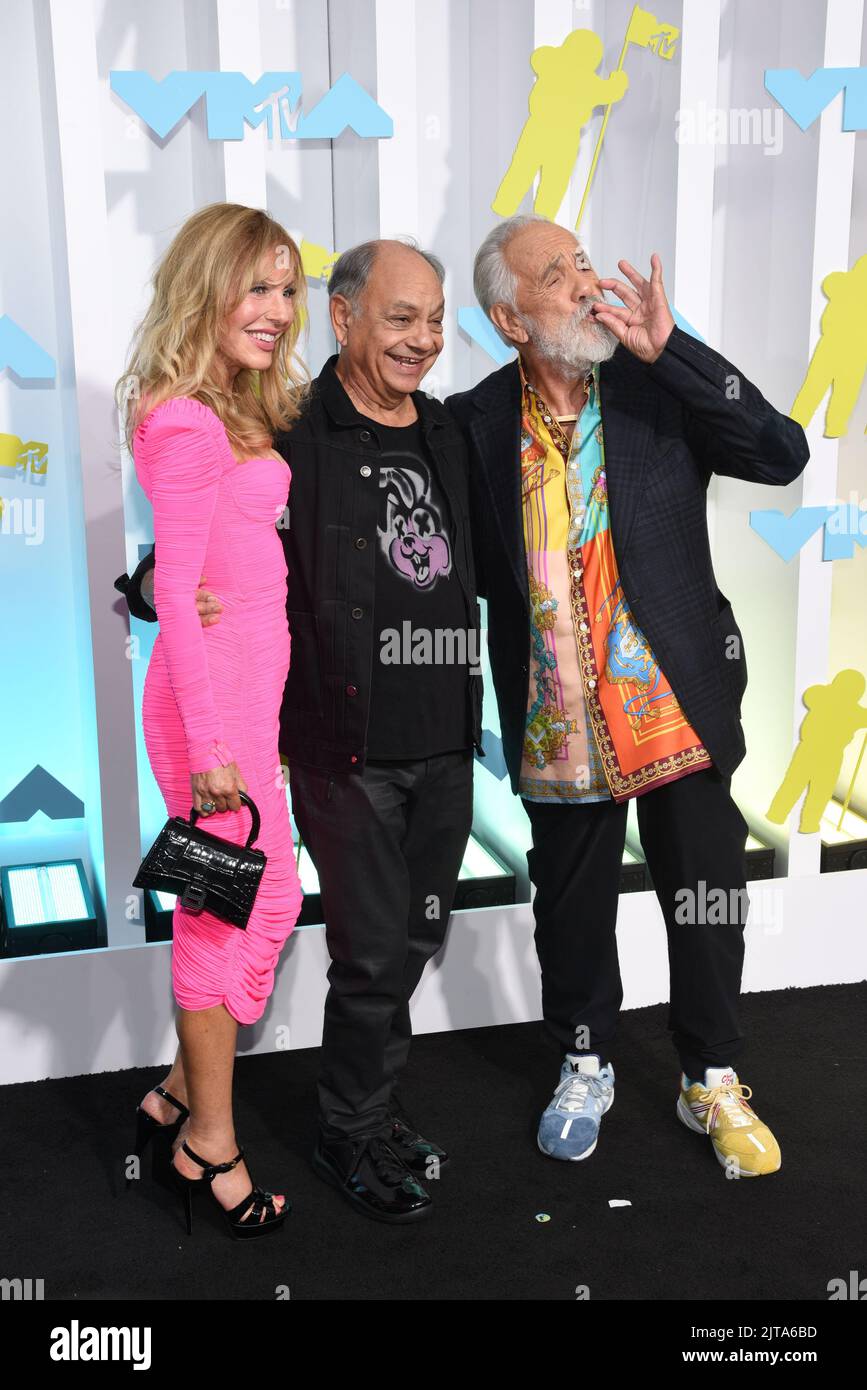Shelby Chong, Cheech Marin and Tommy Chong walking on the black carpet ...