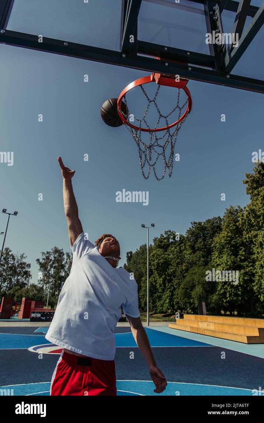 Basketball player throwing ball stadium hi-res stock photography and ...