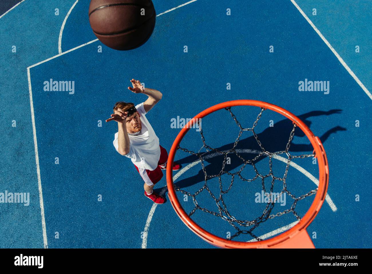 top view of young man playing basketball on modern court Stock Photo ...