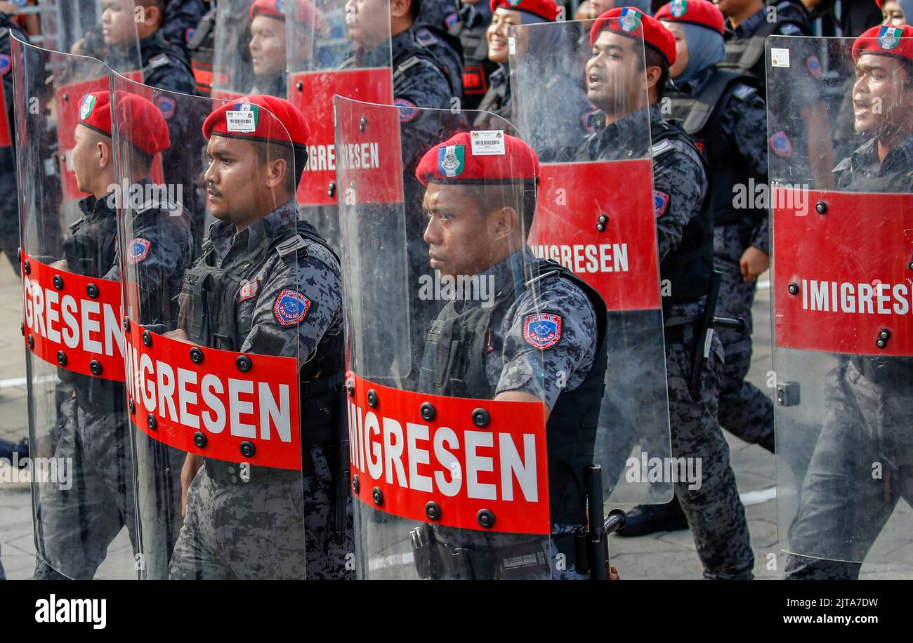 Malaysian immigration personnel hi-res stock photography and images - Alamy
