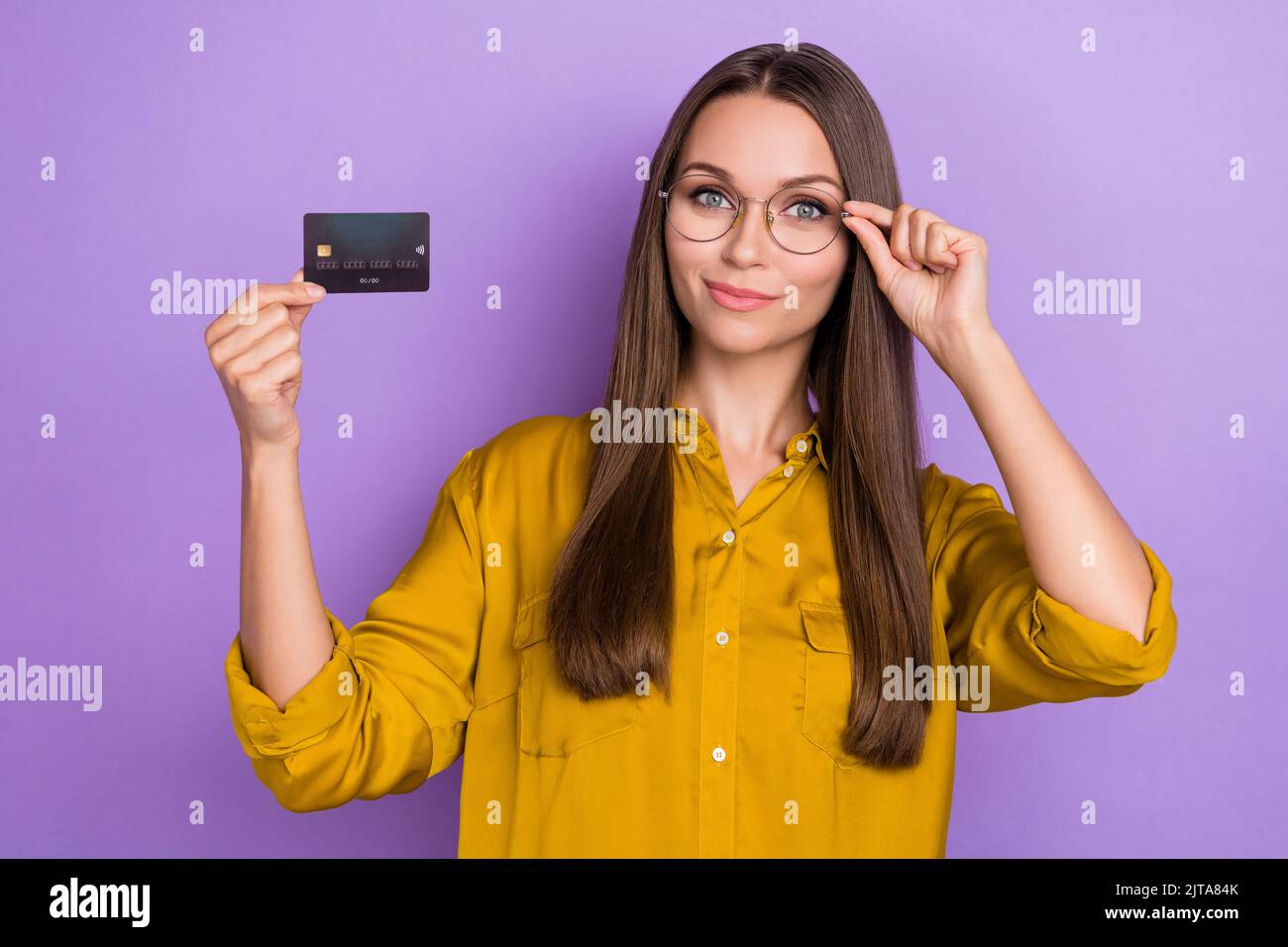 Photo of hr brown hair lady hold card wear eyewear brown shirt isolated ...