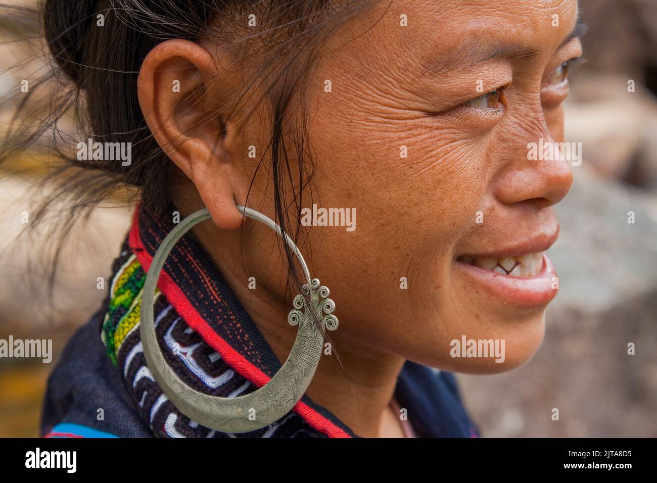 Vietnam, Sapa region. Portrait of a Hmong woman with an traditional ...