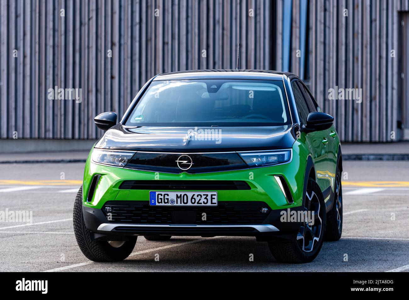 Riga, Latvia - 26 March, 2021: green electric vehicle Opel Mokka-e in ...