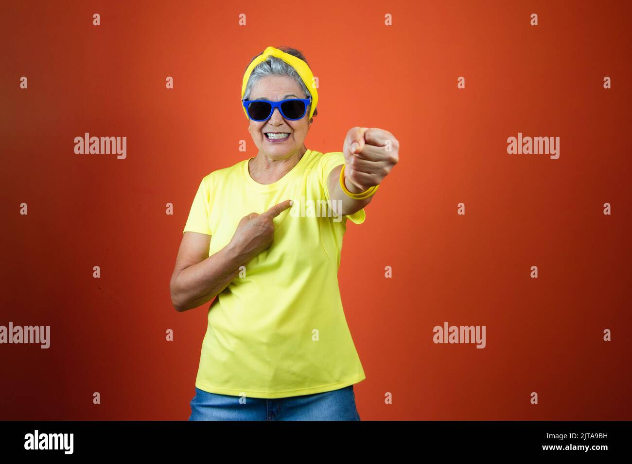 Brazil Independence Day - Mature Woman with Gray Hair, yellow shirt ...