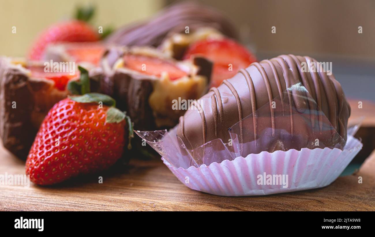 Strawberry bonbon in close-up photo. Brazilian sweet. Brazilian dessert ...