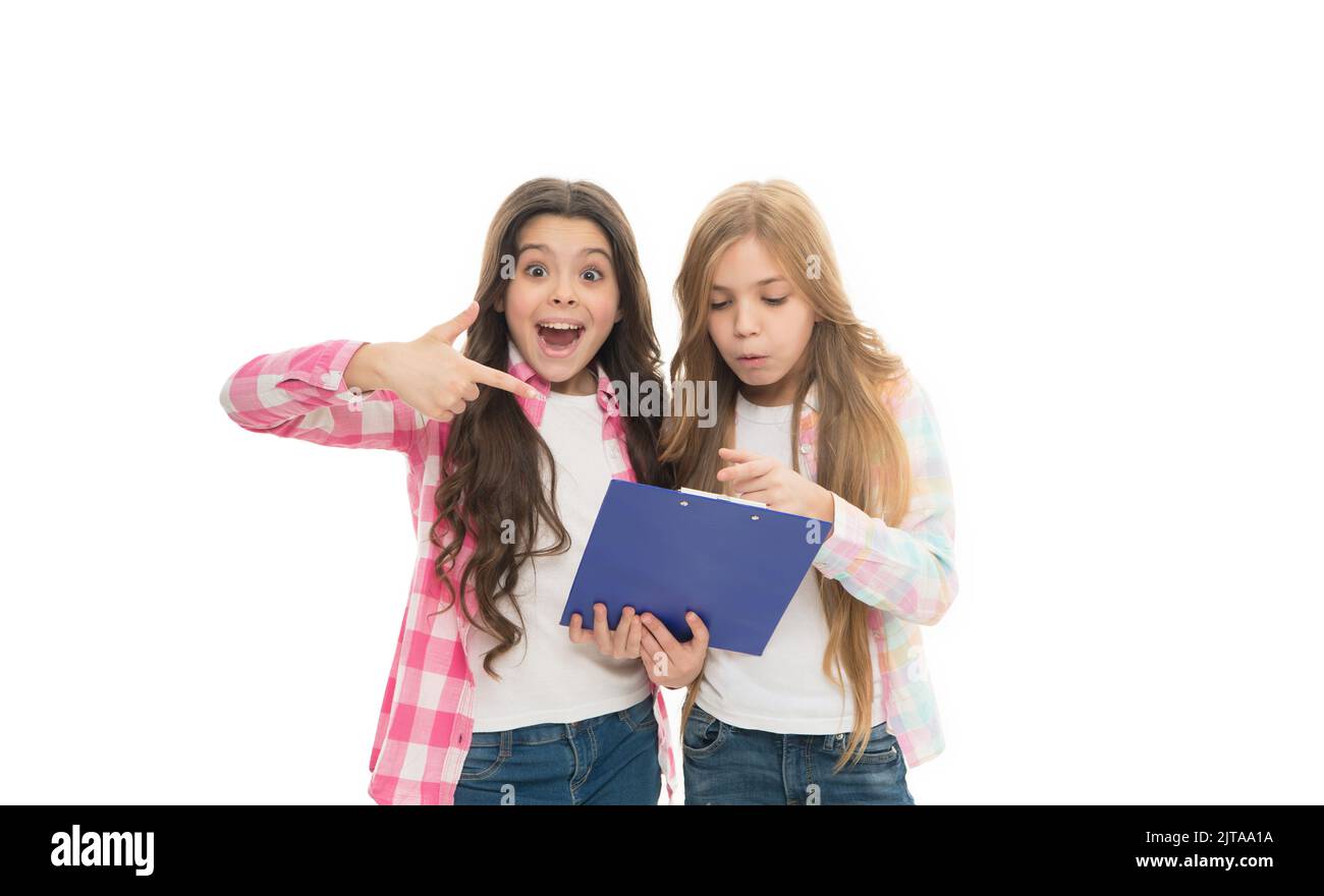 After examination. Excited children checking up examination result in ...