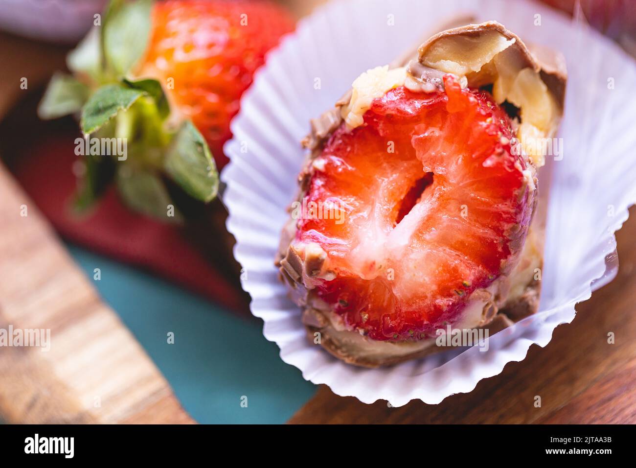 Strawberry bonbon in close-up photo. Brazilian sweet. Brazilian dessert ...