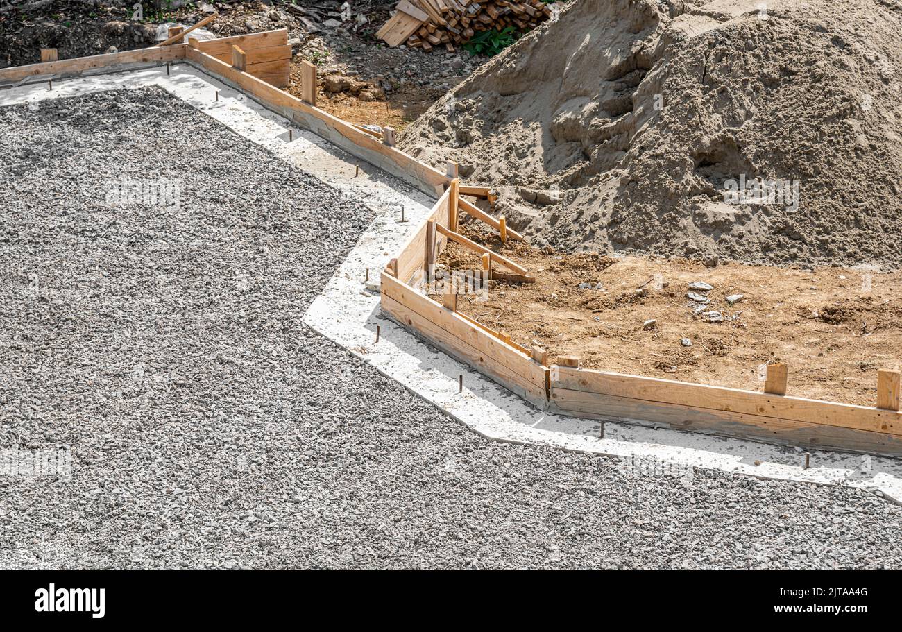 Concrete foundation and backfilling of rubble Stock Photo - Alamy