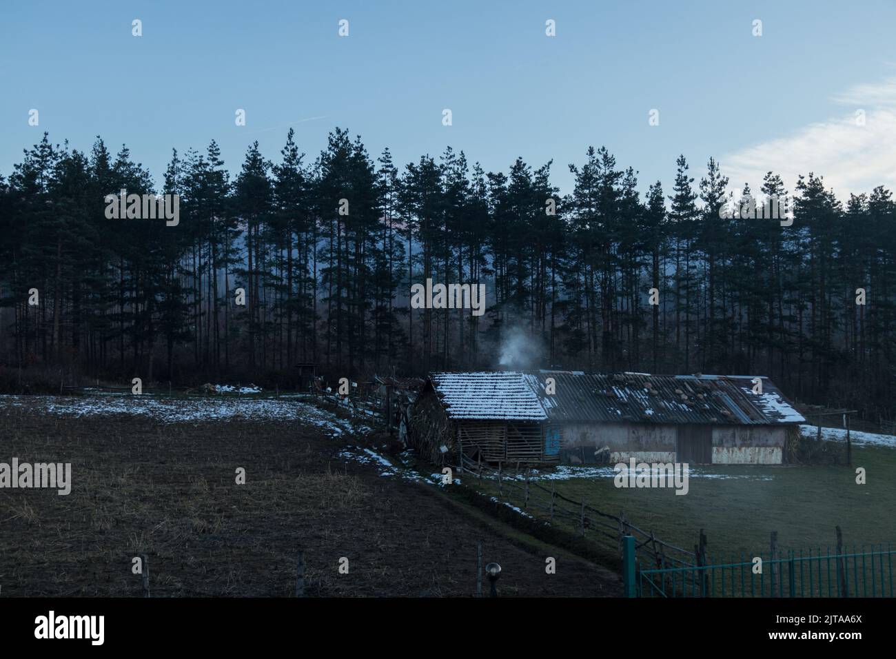 Cozy winter village sunrise hi-res stock photography and images - Alamy